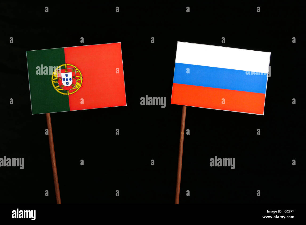 Portuguese flag with Russian flag isolated on black background Stock ...