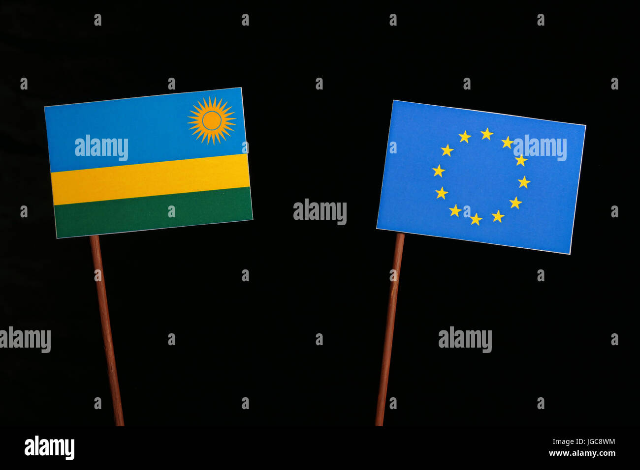 Rwanda flag with European Union (EU) flag isolated on black background ...
