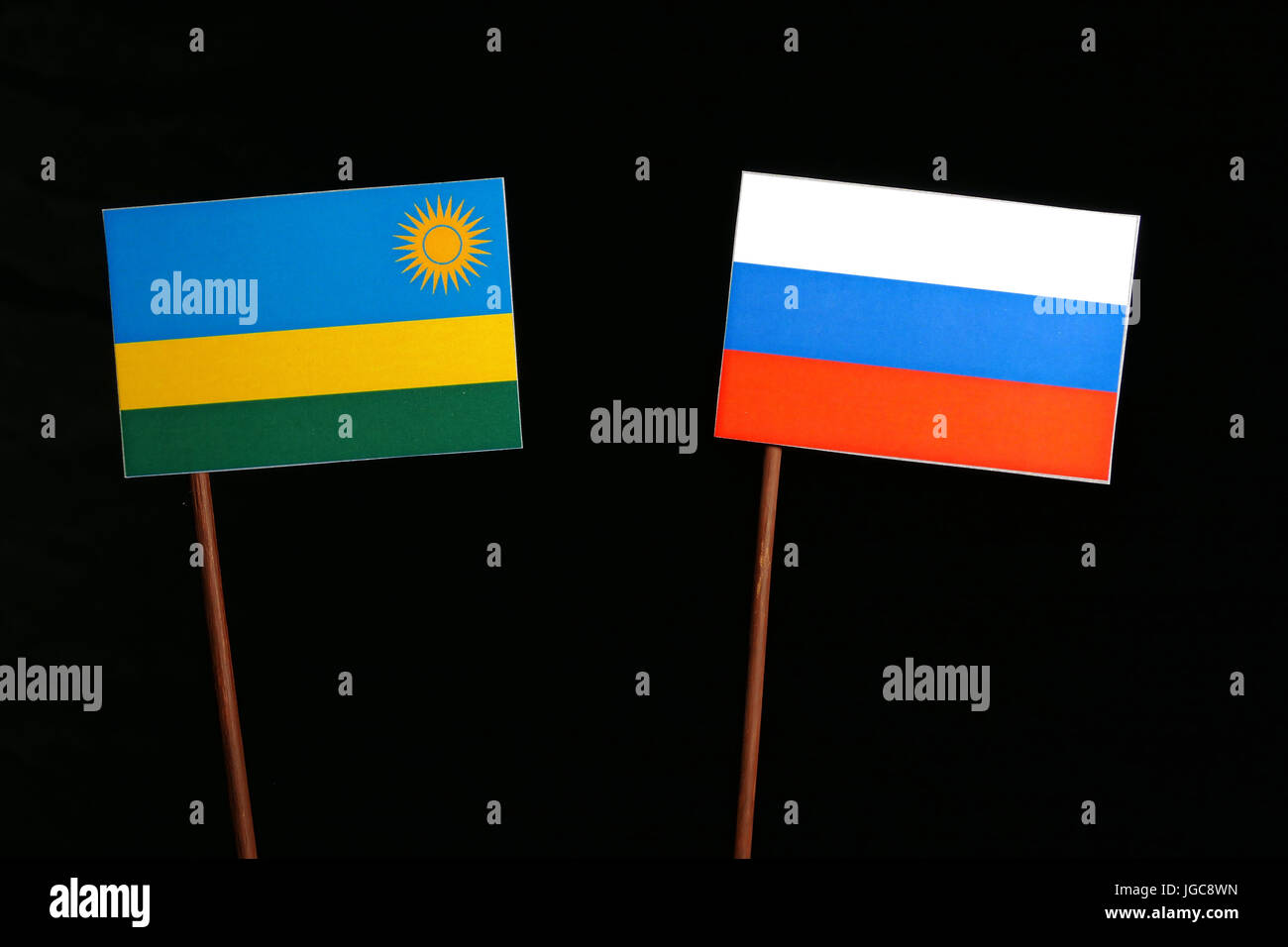 Rwanda flag with Russian flag isolated on black background Stock Photo ...