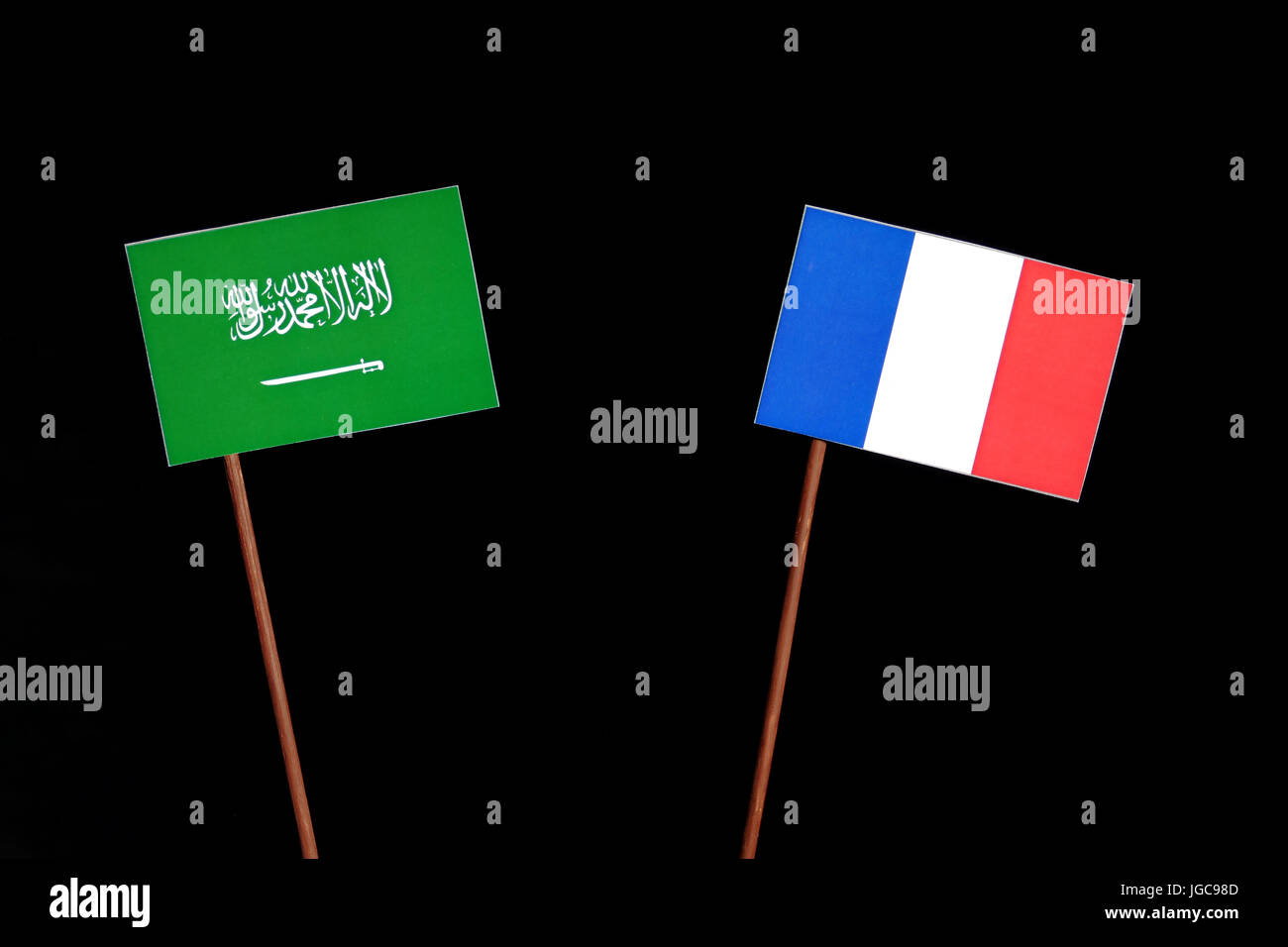 Saudi Arabian flag with French flag isolated on black background Stock ...