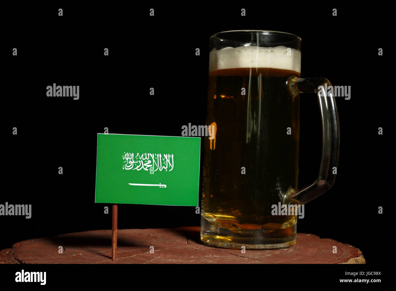 Saudi Arabian flag with beer mug isolated on black background Stock ...
