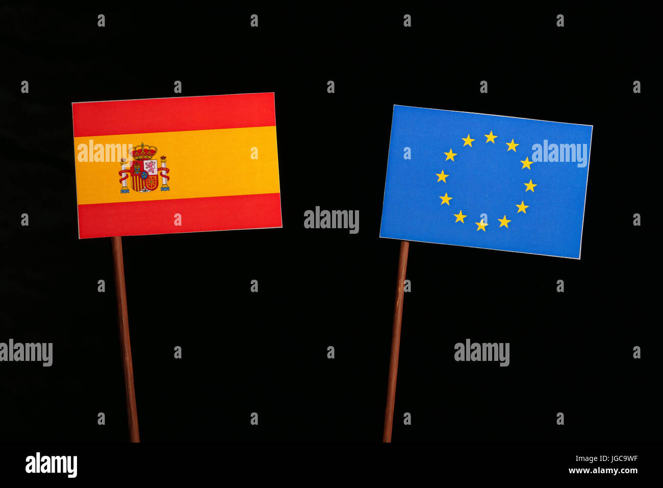 Spanish flag with European Union (EU) flag isolated on black background ...