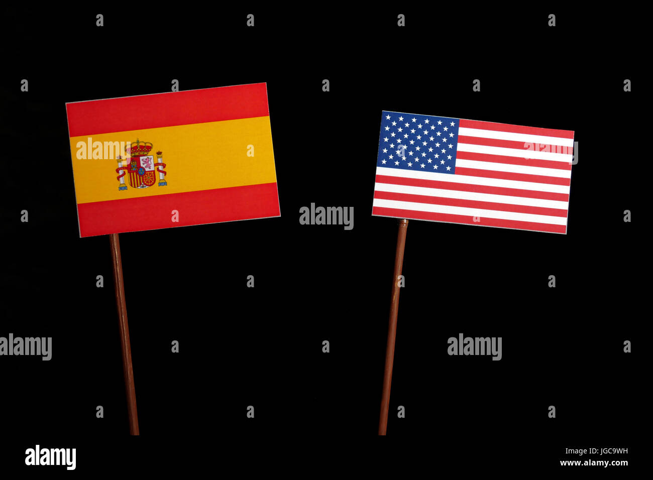 Spanish flag with USA flag isolated on black background Stock Photo - Alamy
