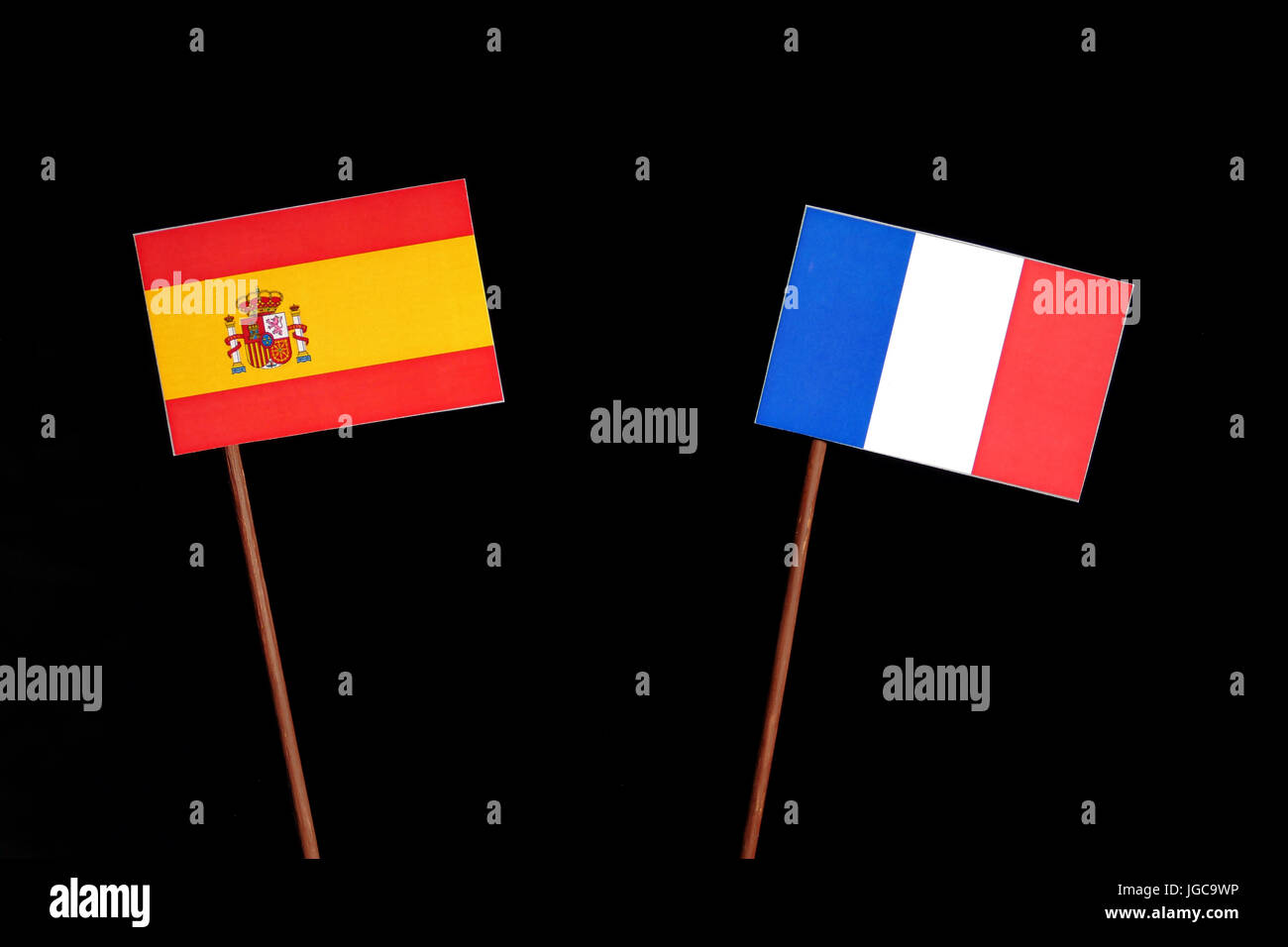 Spanish flag with French flag isolated on black background Stock Photo ...