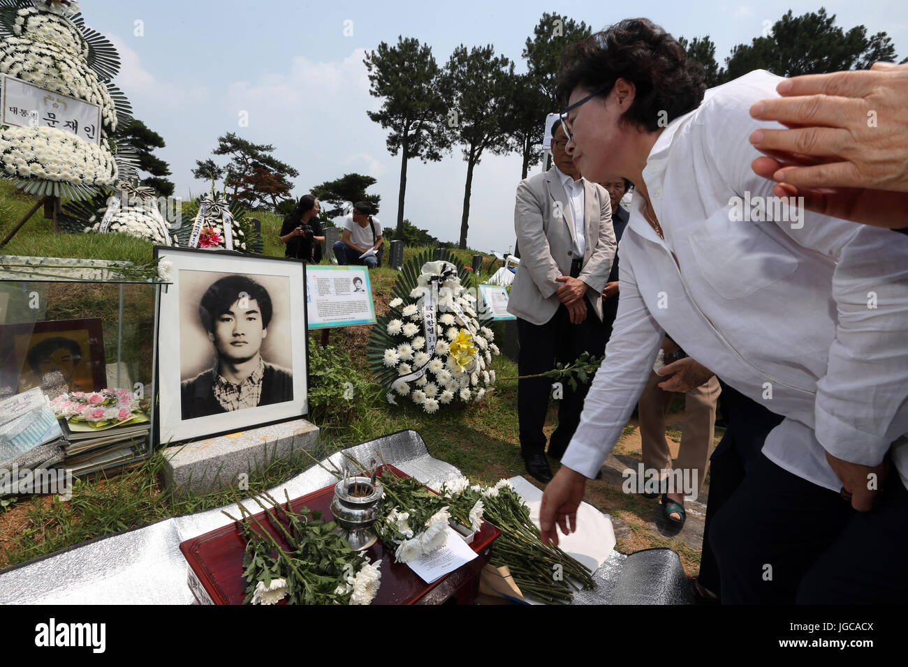 Memorial for 30th anniv. of student activist's death A mourner places a ...