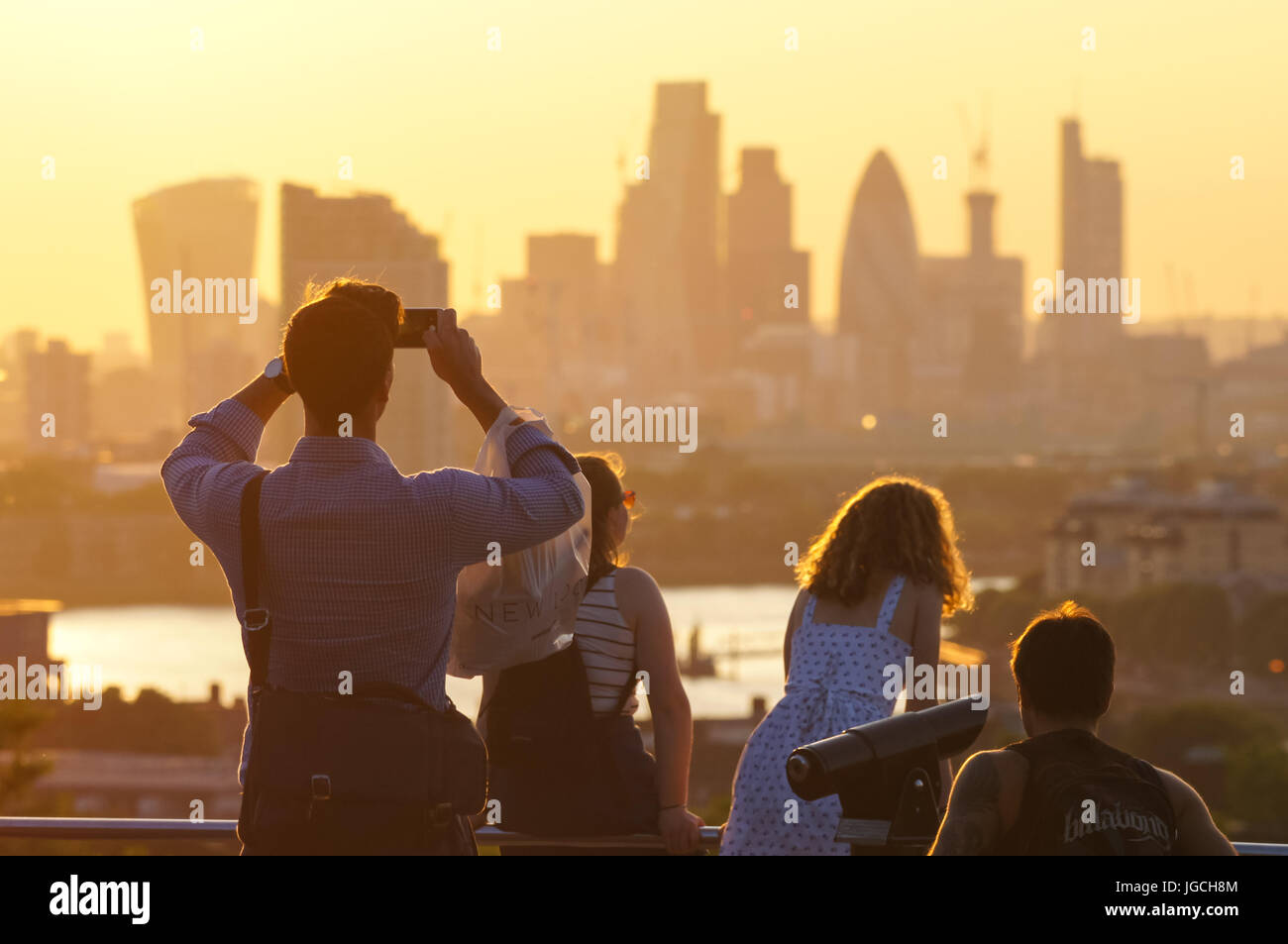 People watching sunset at Greenwich Park, London, England, United ...