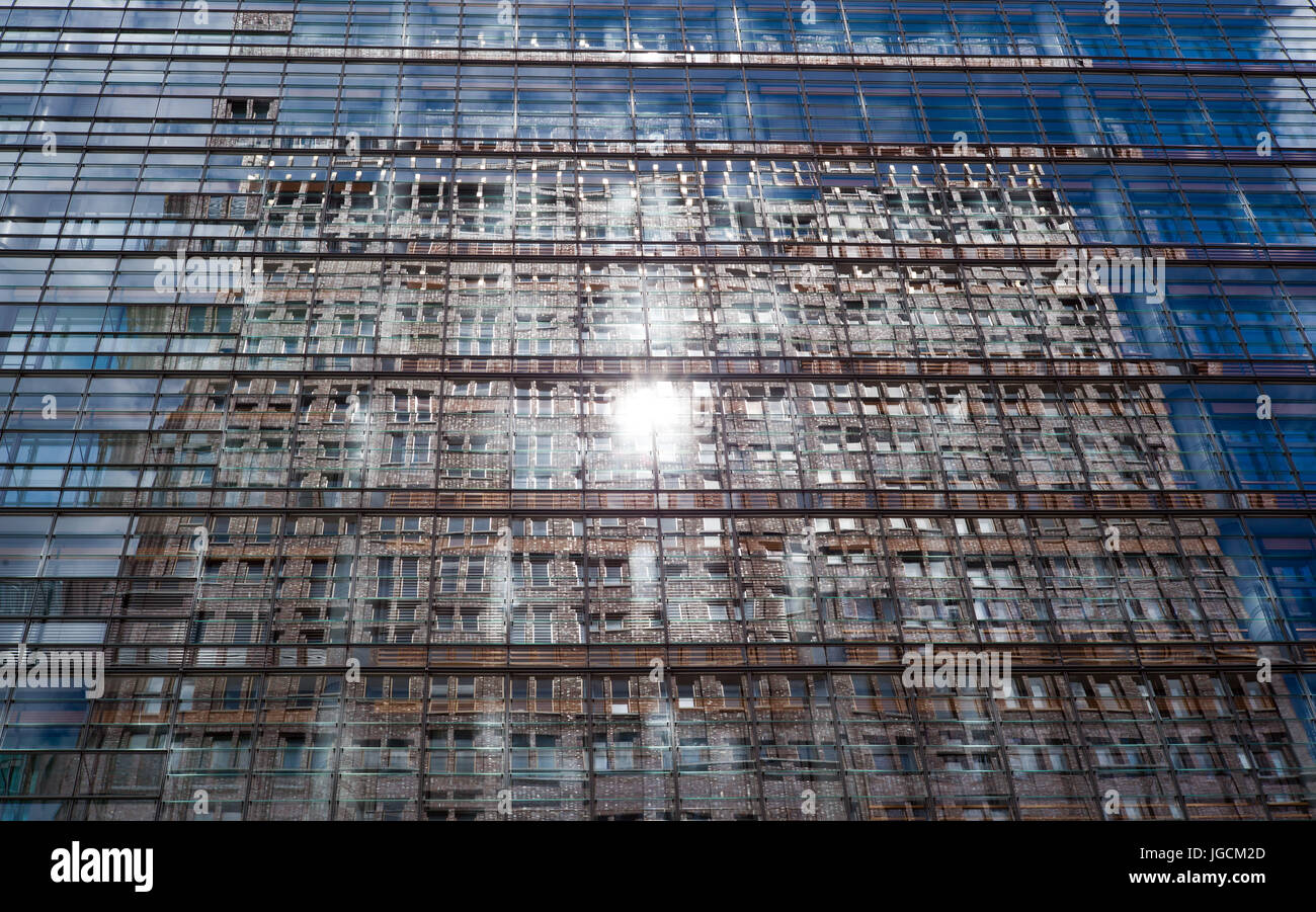A high-rise building reflects the sunshine in its facade at Potsdamer ...