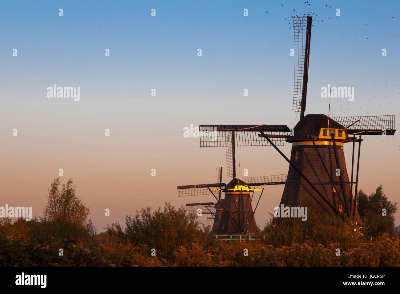 Row of windmills, Kinderdijk, Holland Stock Photo - Alamy