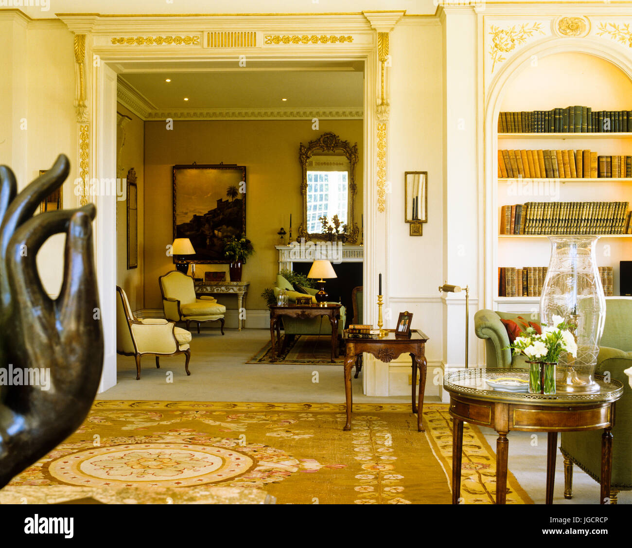 Edwardian living room with recessed bookshelf Stock Photo - Alamy