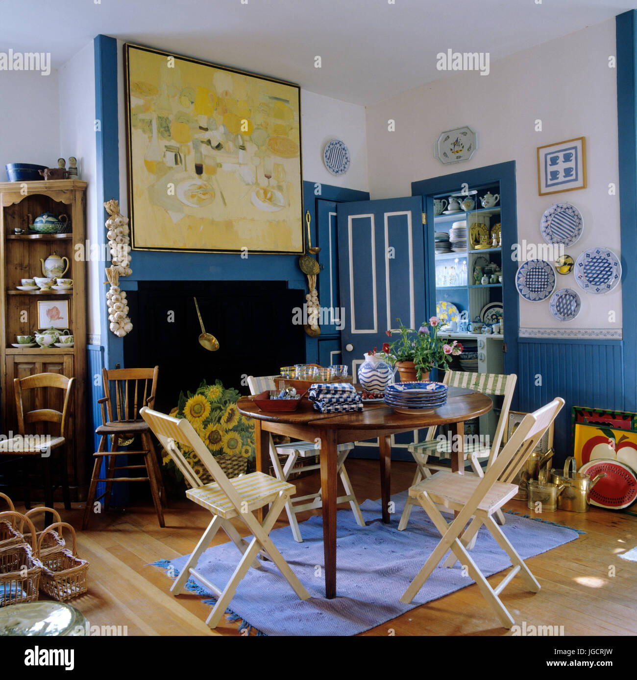 Cluttered dining room Stock Photo - Alamy