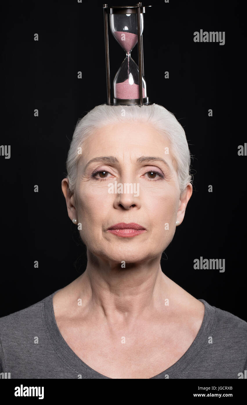 Clock on head hi-res stock photography and images - Alamy