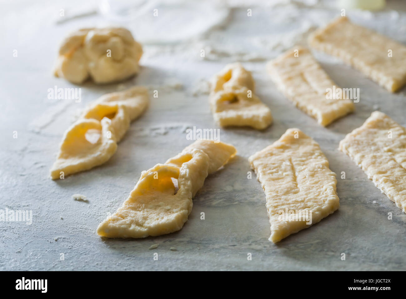 Cutting from fresh dough tasty and homemade donuts Stock Photo - Alamy