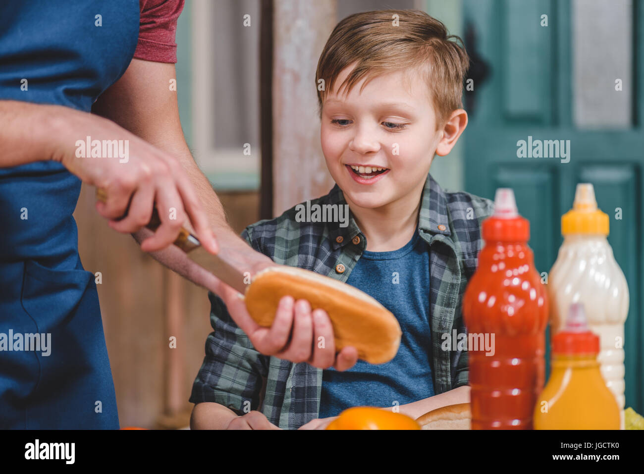 Cutting bun hi-res stock photography and images - Alamy