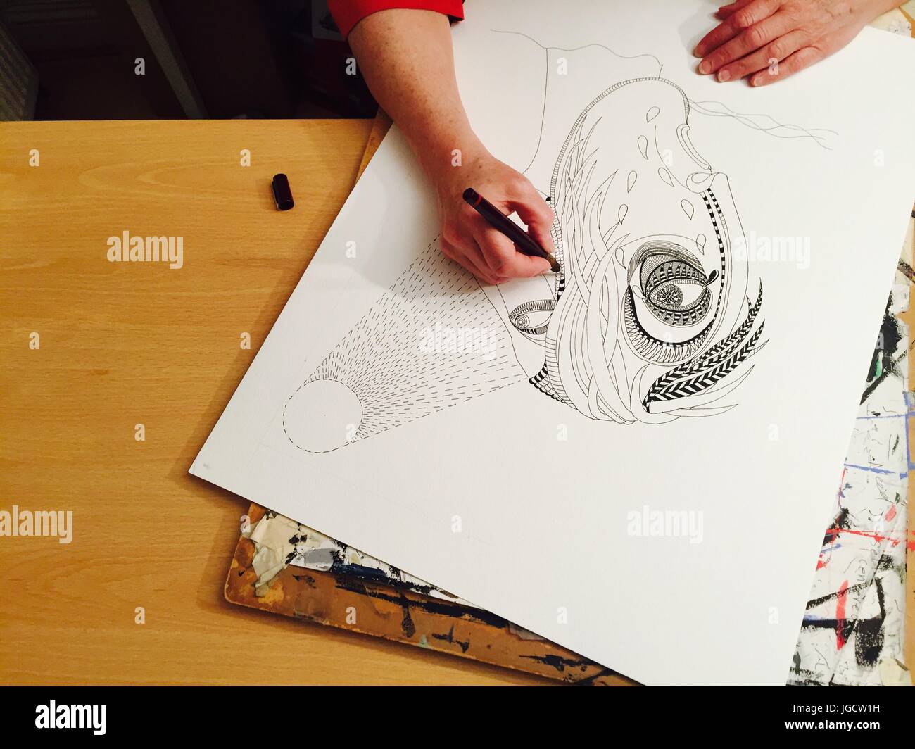 Overhead view of an illustrator drawing Stock Photo - Alamy