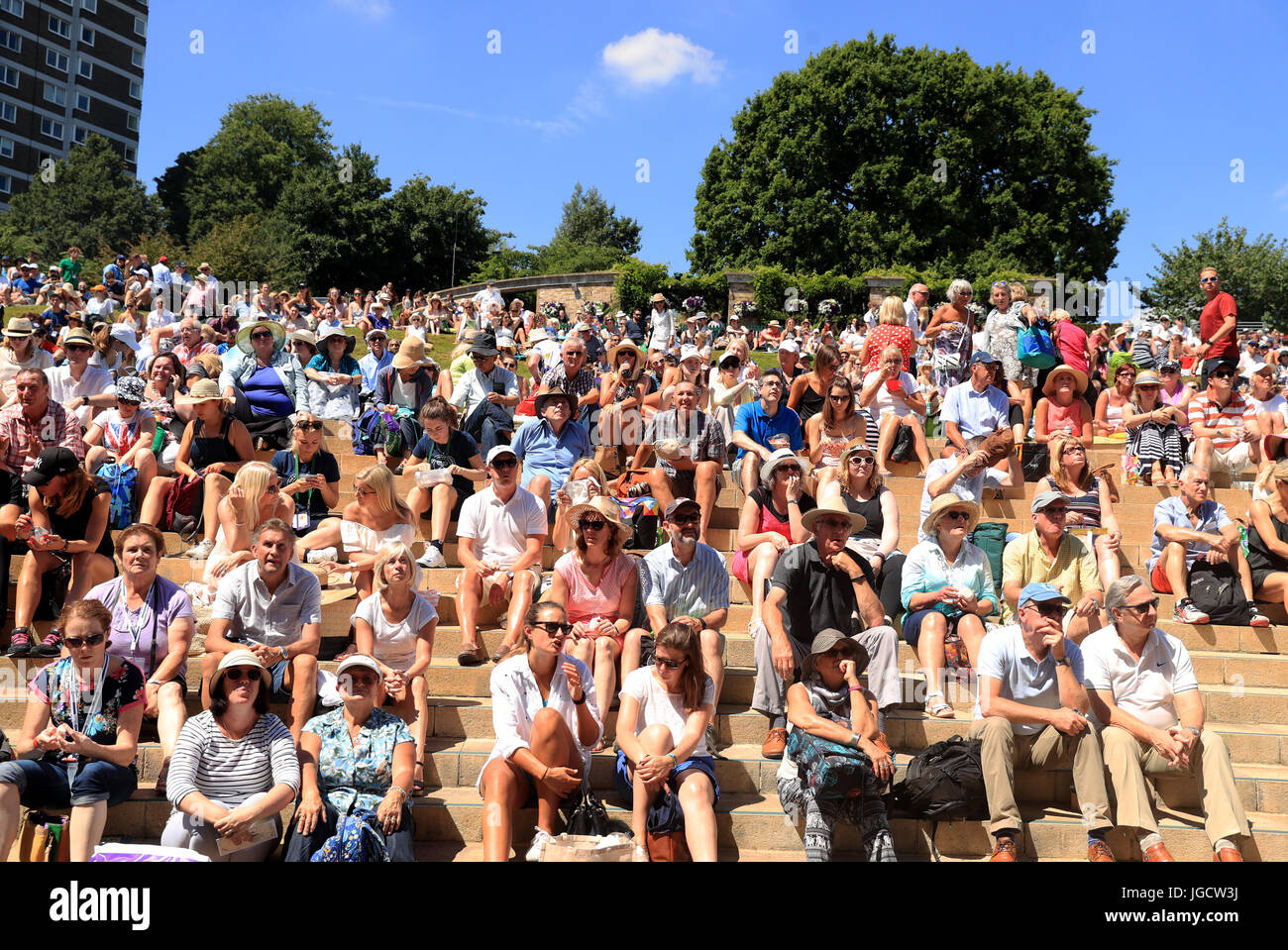 Spectators watch the big screen on Murray Mound on day three of the ...