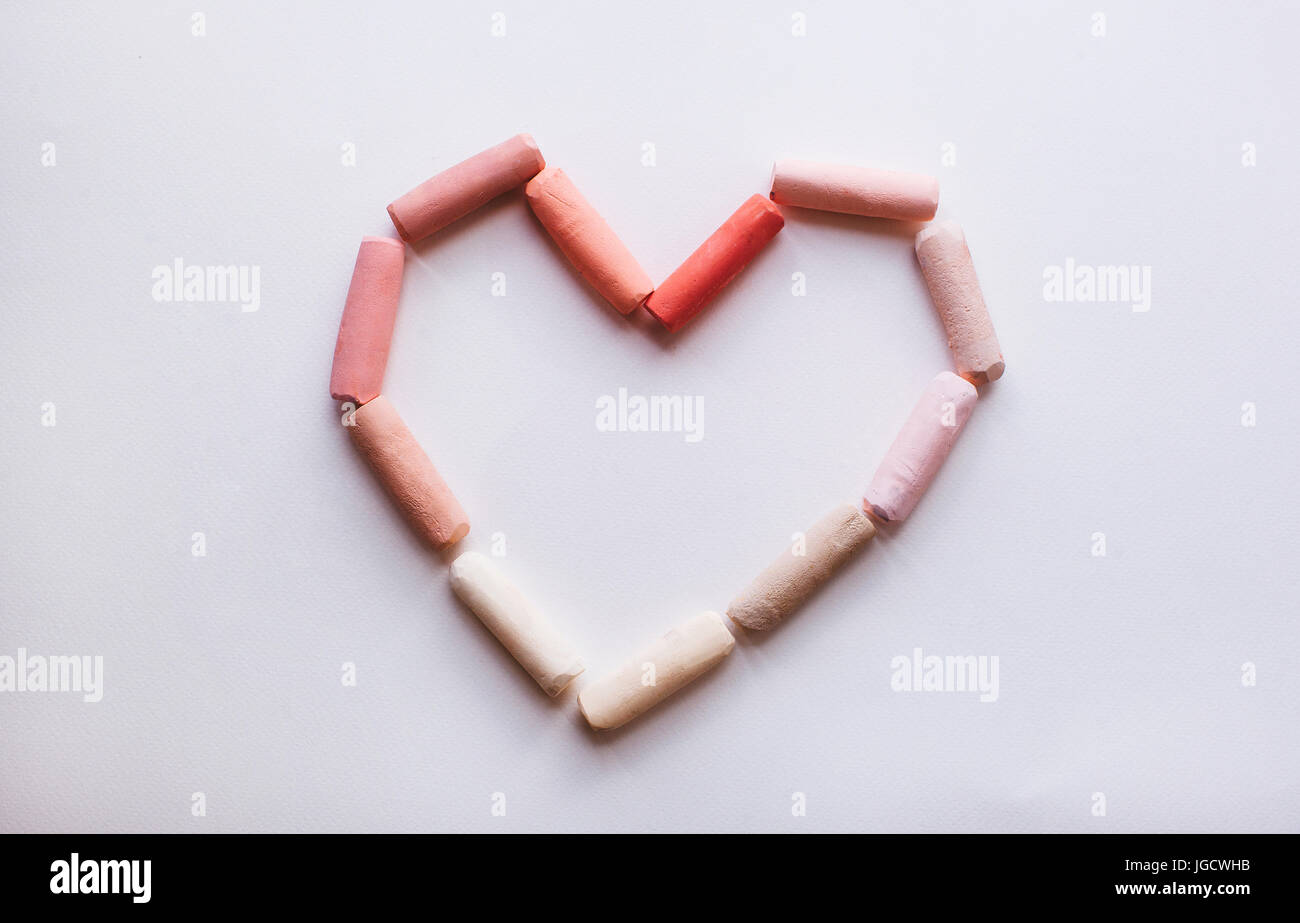 Heart shape made from pastel sticks Stock Photo - Alamy