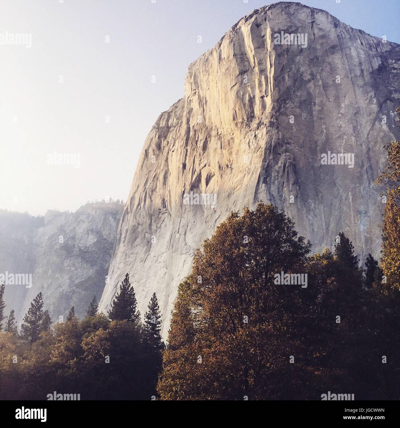 Sunlight on a rock in yosemite valley Stock Photo - Alamy