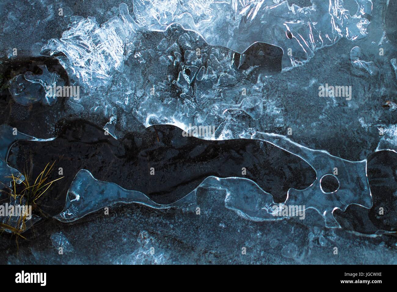 Frozen water in a lake Stock Photo - Alamy