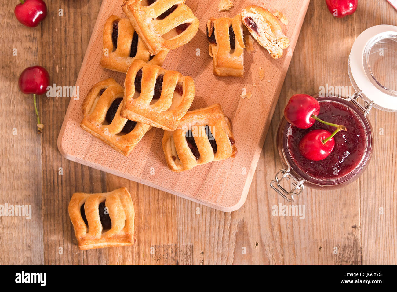 Cherry pastry pies Stock Photo - Alamy