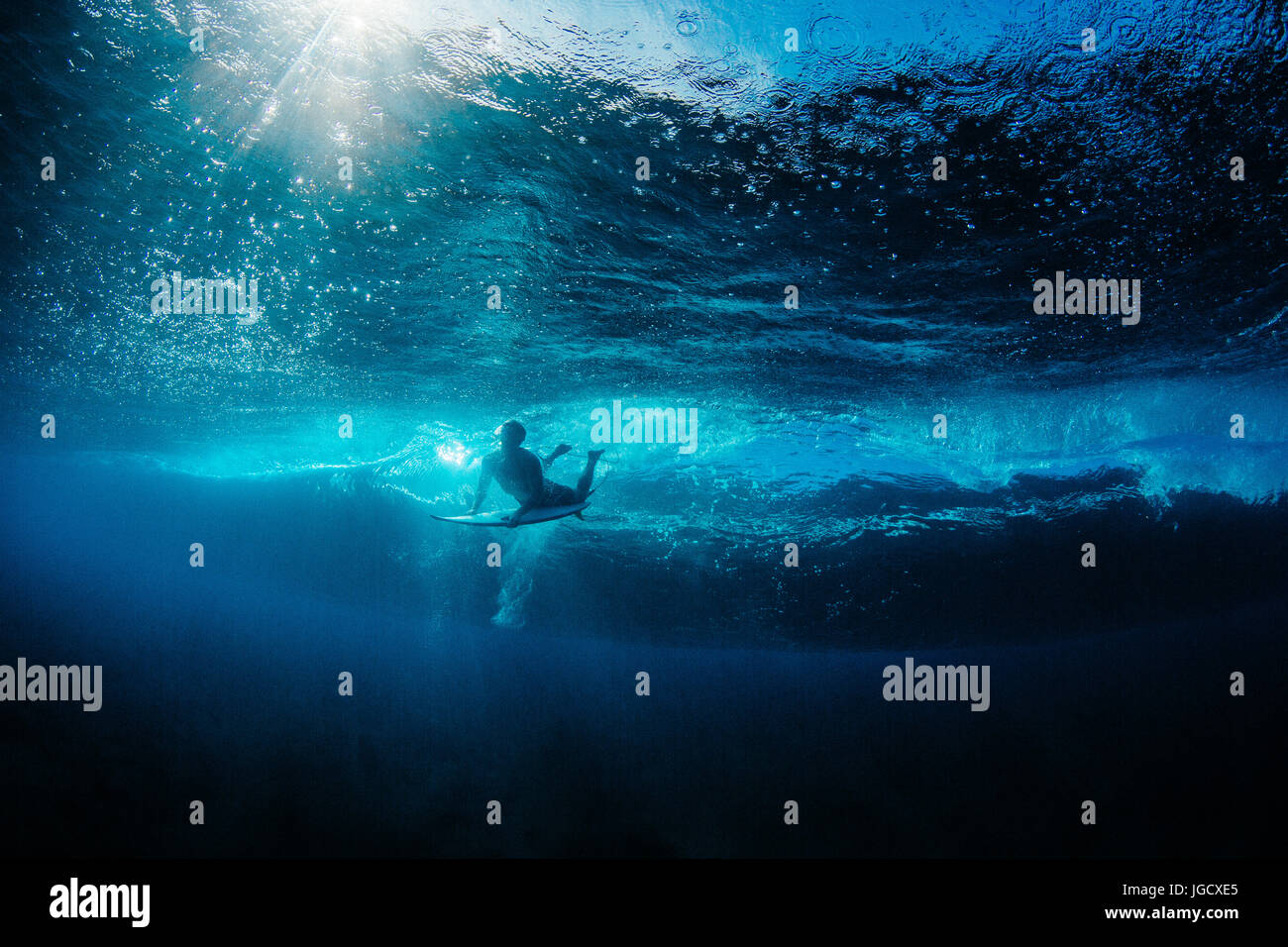 Man Duck Diving under a wave, Hawaii, America, USA Stock Photo - Alamy