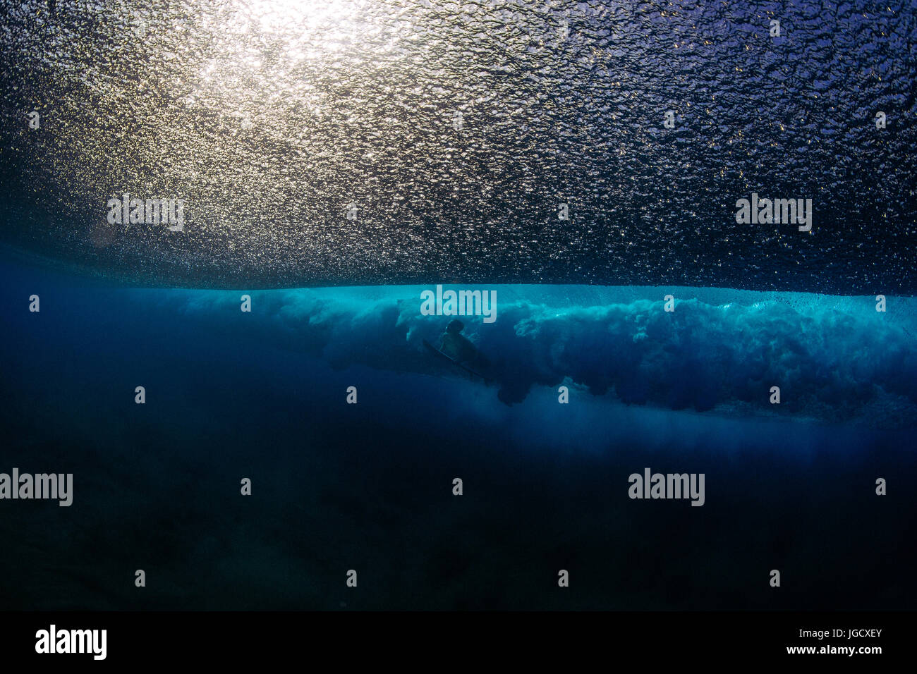 Underwater view man surfing wave hi-res stock photography and images ...