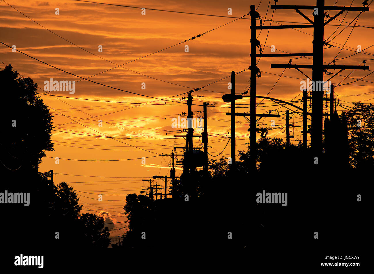 Low Sun Silhouette of Neighborhood Stock Photo - Alamy