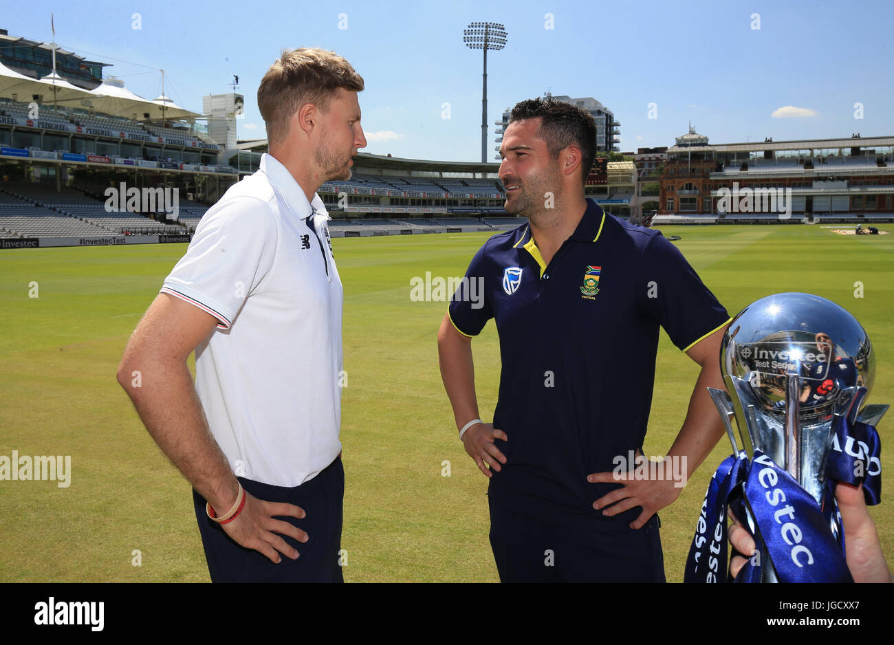 England's captain Joe Root (left) and South Africa's captain Dean Elgar ...