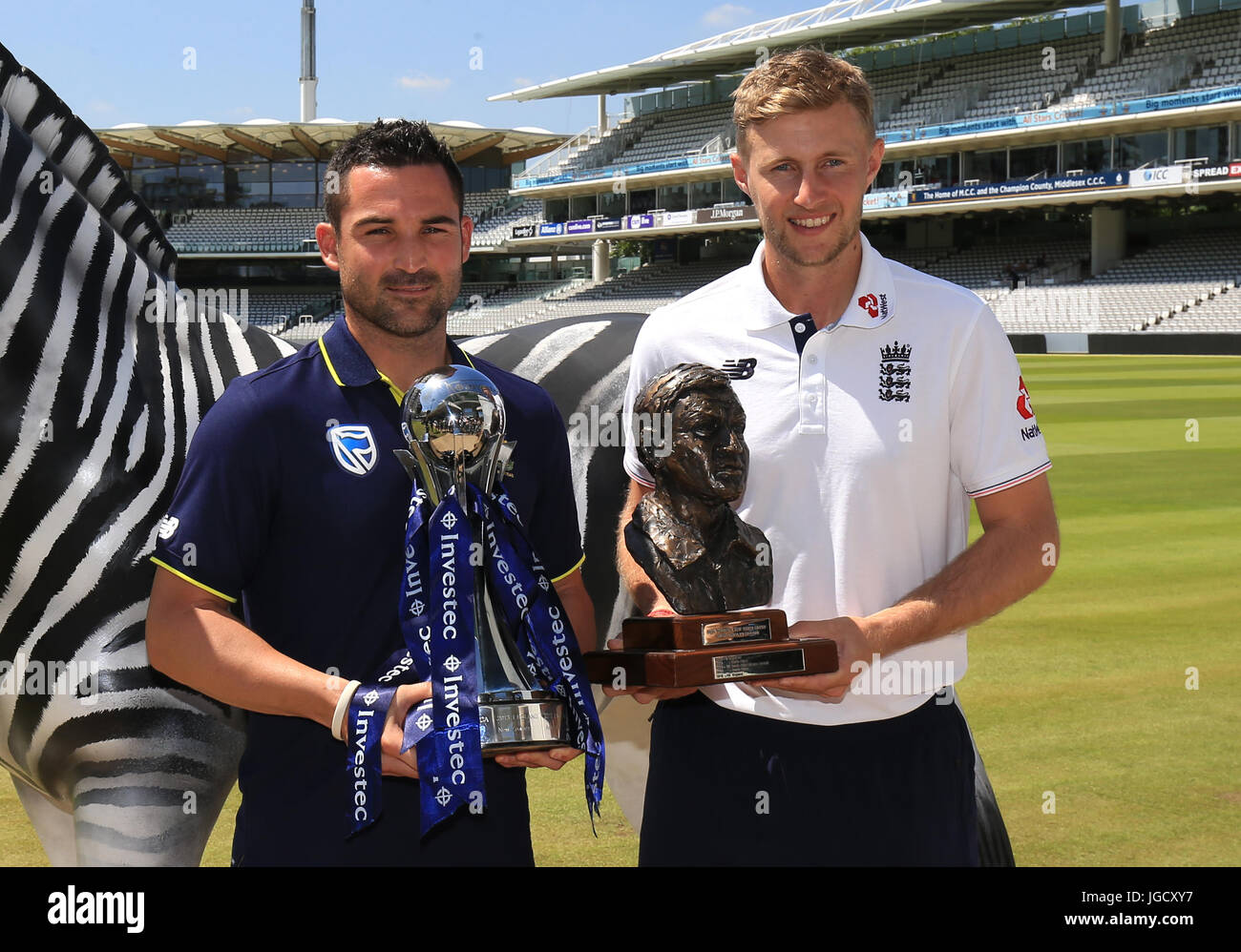 England's captain Joe Root (left) and South Africa's captain Dean Elgar ...