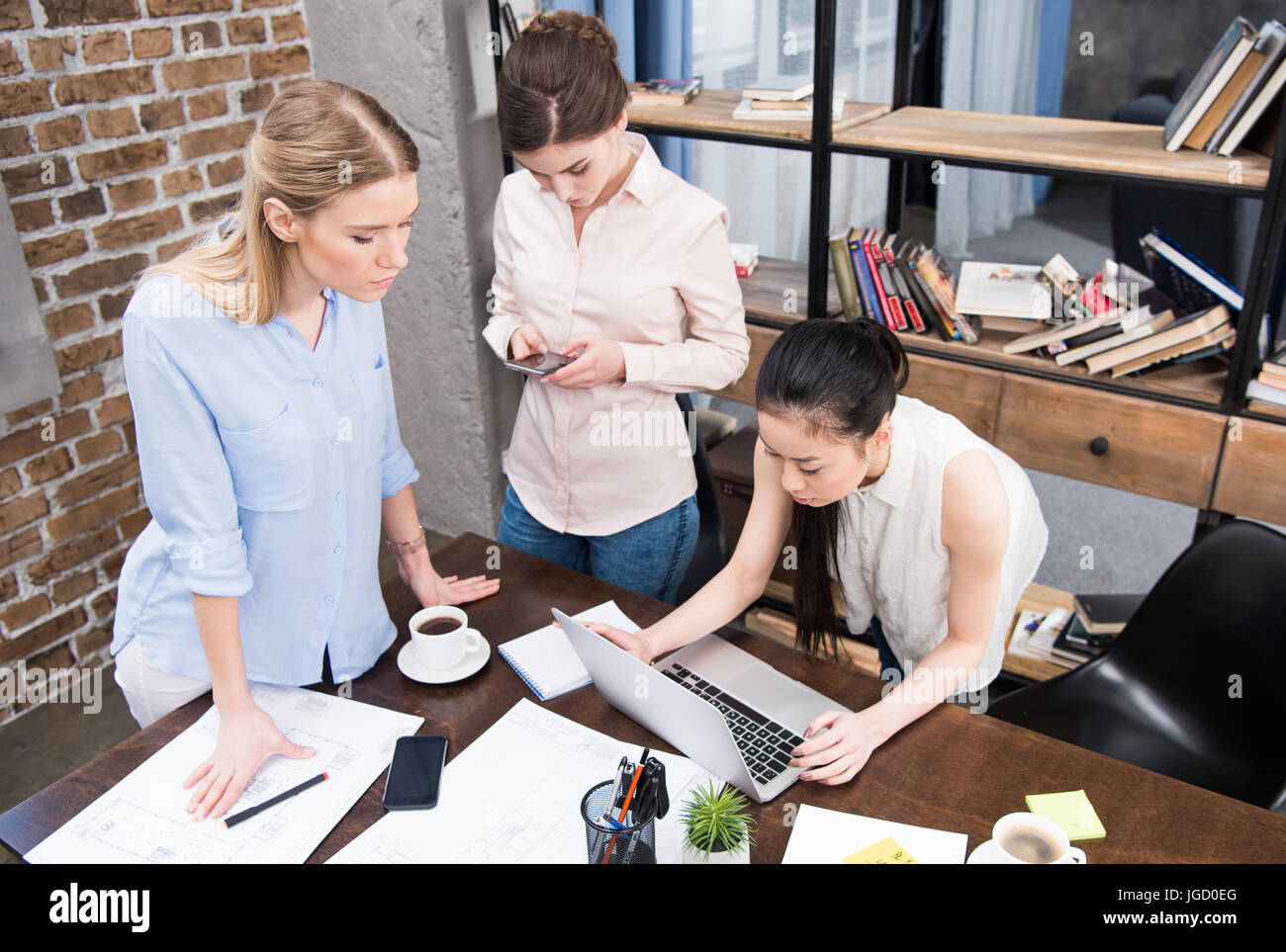 Modern multicultural working together hi-res stock photography and ...