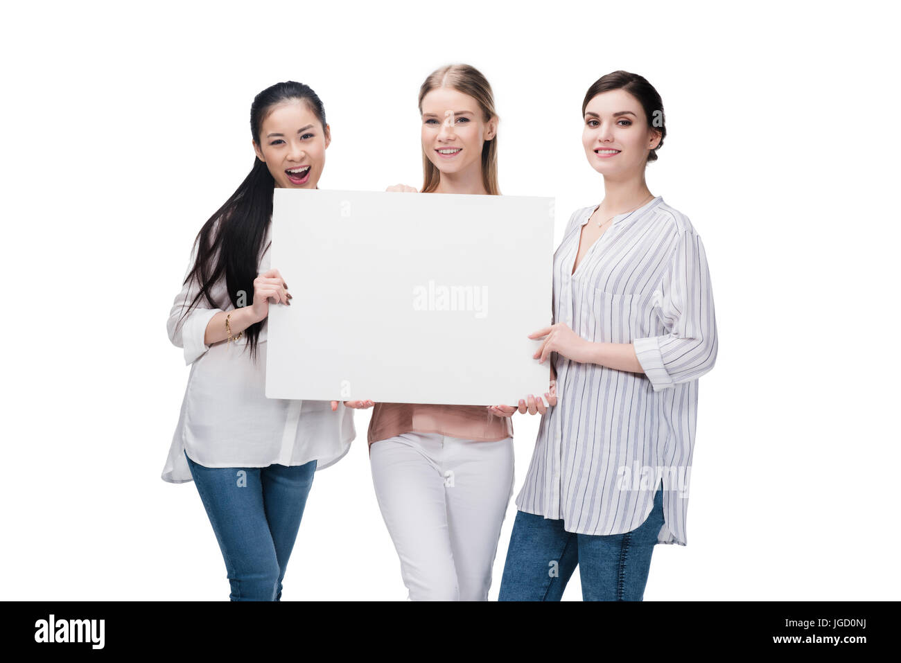young smiling girls holding blank banner isolated on white Stock Photo ...