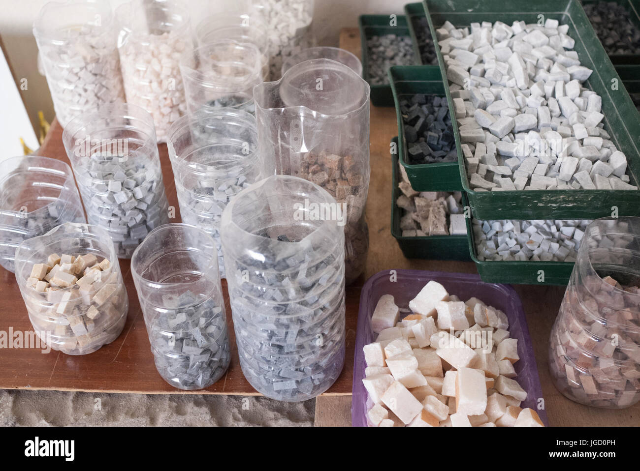Stones cut into pieces to make mosaic art Stock Photo - Alamy