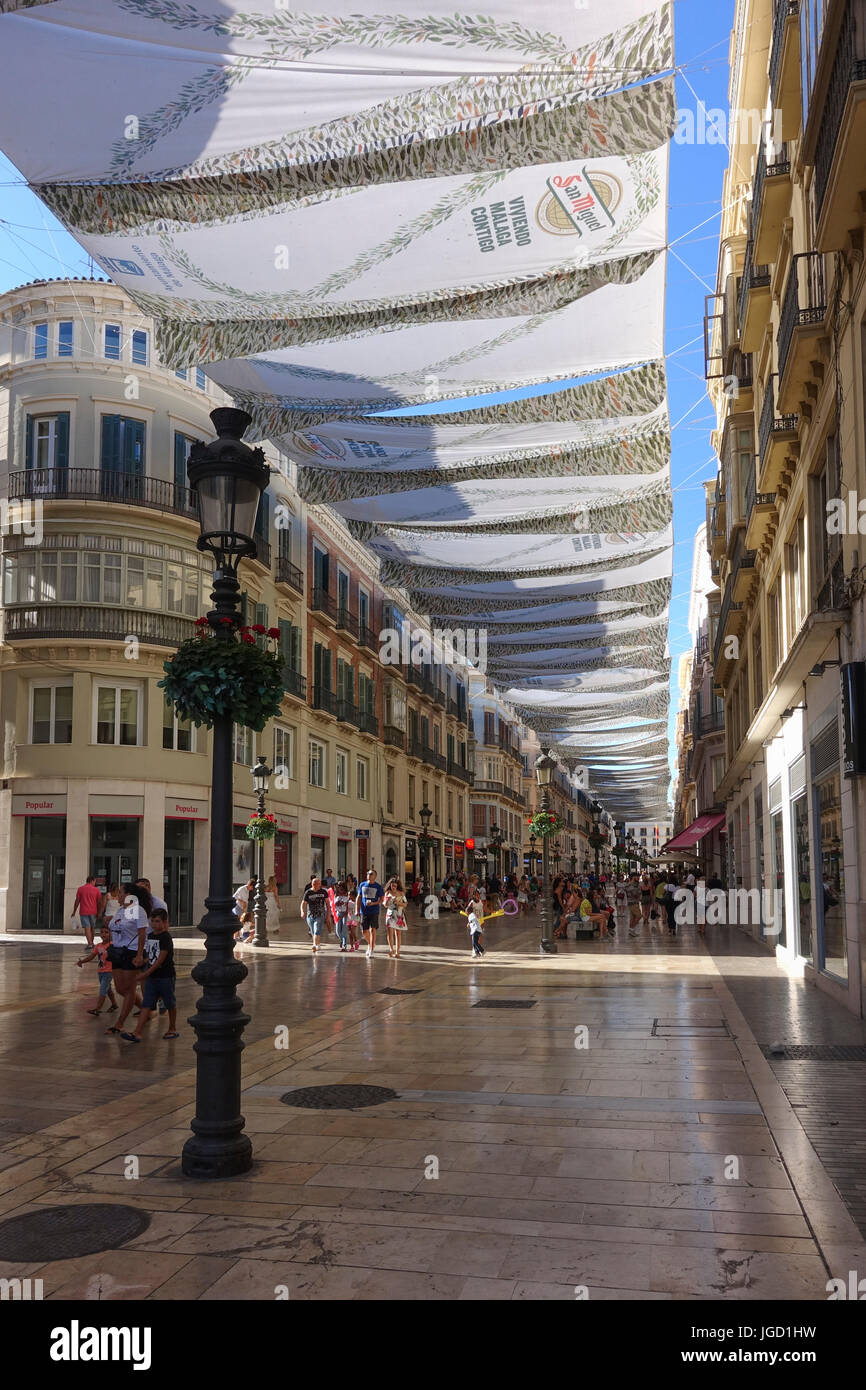 Calle Marqués de Larios Malaga pedestrian main street, covered with sun ...