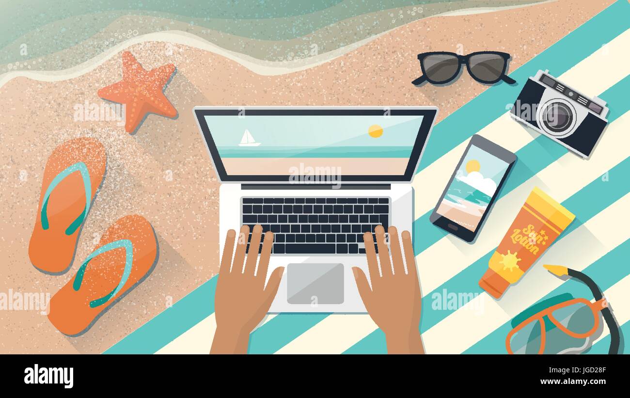 Man relaxing on the beach and connecting with his laptop next to the ...