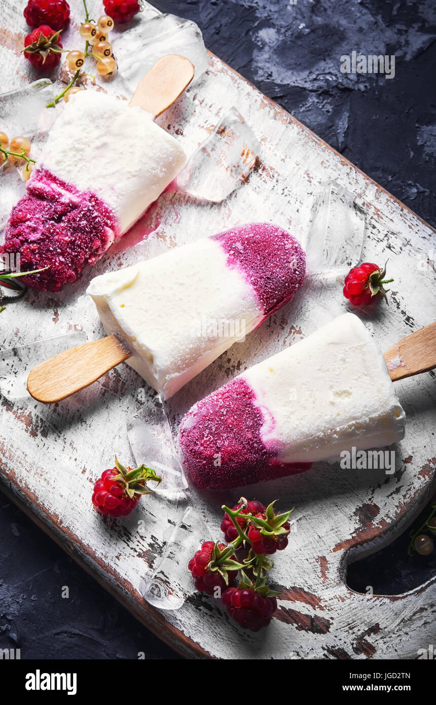 Summer ice cream on a stick with fresh raspberries Stock Photo - Alamy