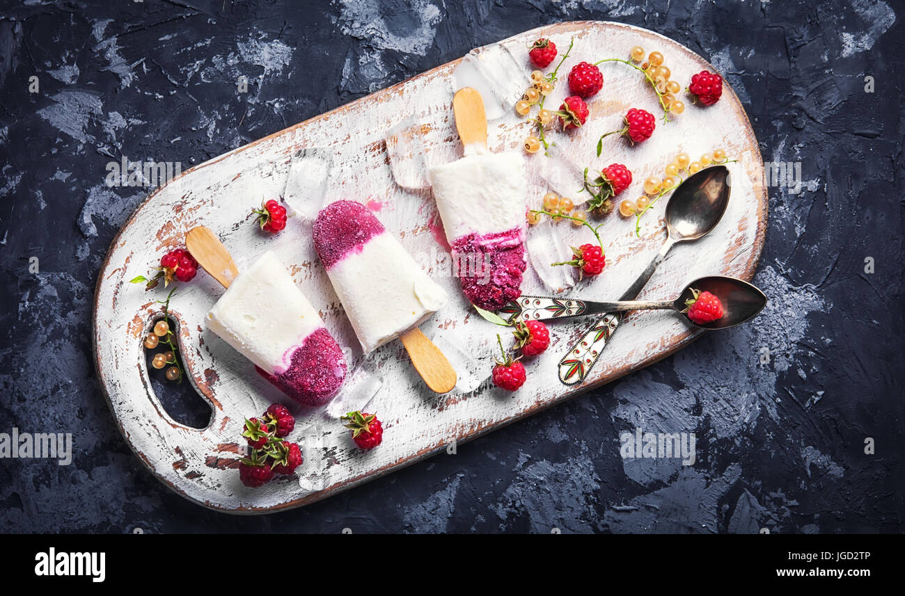 Summer ice cream on a stick with fresh raspberries Stock Photo - Alamy