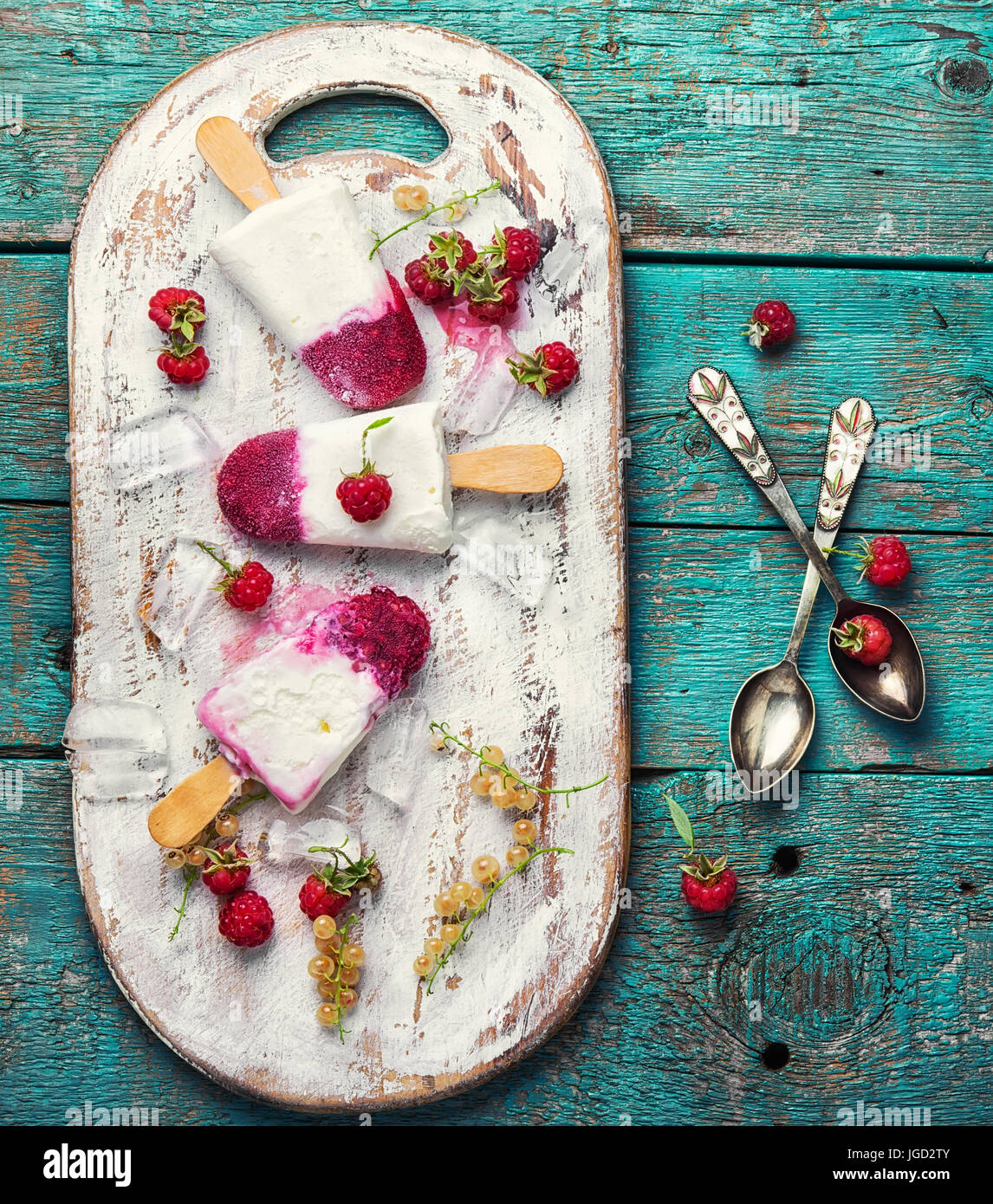Summer ice cream on a stick with fresh raspberries Stock Photo - Alamy
