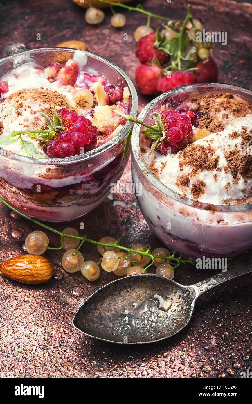 Sundae ice cream with raspberry flavours in glass mug Stock Photo - Alamy