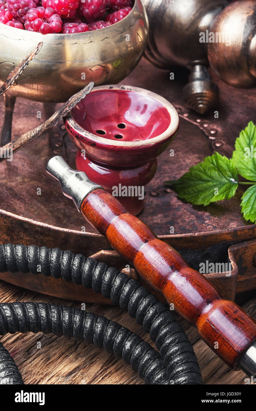 Smoking Turkish hookah with tobacco with raspberry flavor Stock Photo ...
