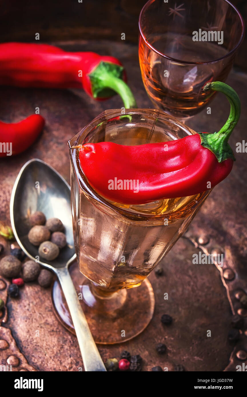 hot chili pepper cocktail with strong alcohol Stock Photo - Alamy