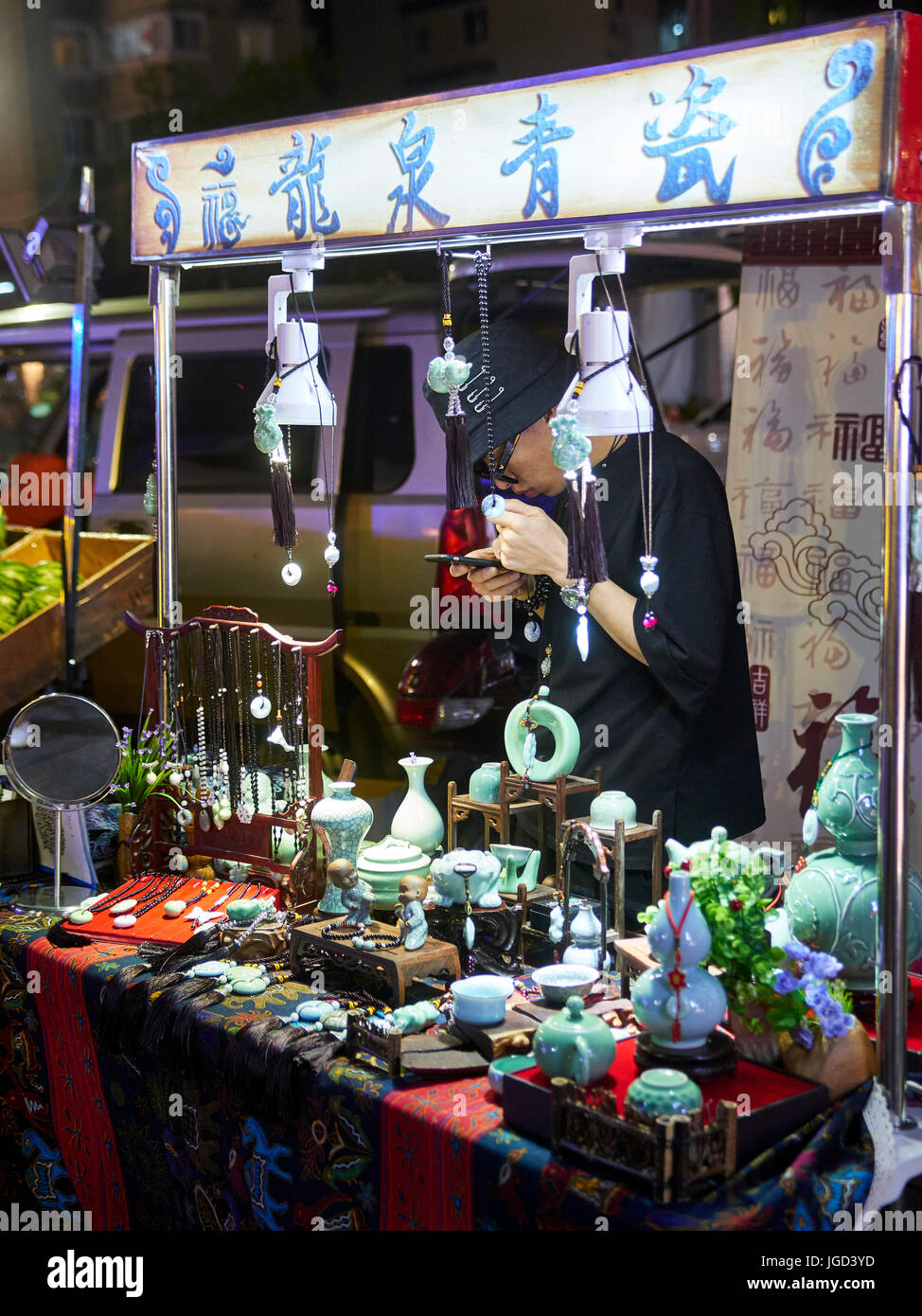 Street seller in the Wu Lin Night Market, Hangzhou China - traditional ...