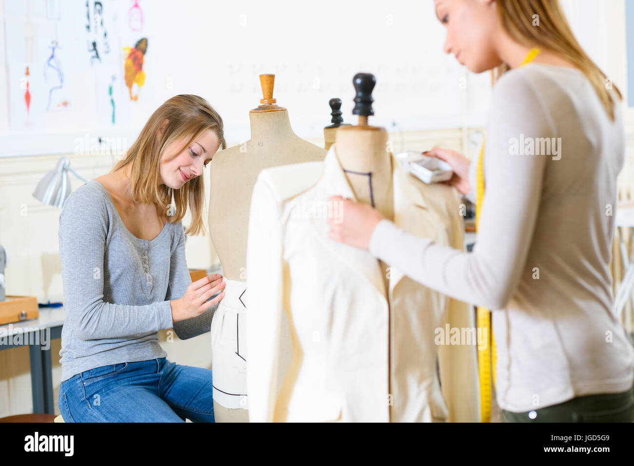 dressmakers in training class Stock Photo - Alamy