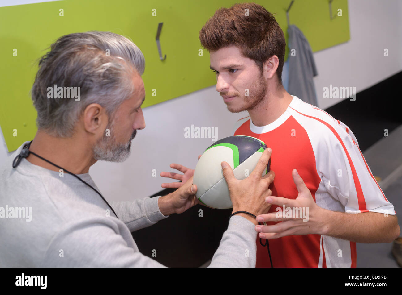 Serious rugby player holding hi-res stock photography and images - Alamy
