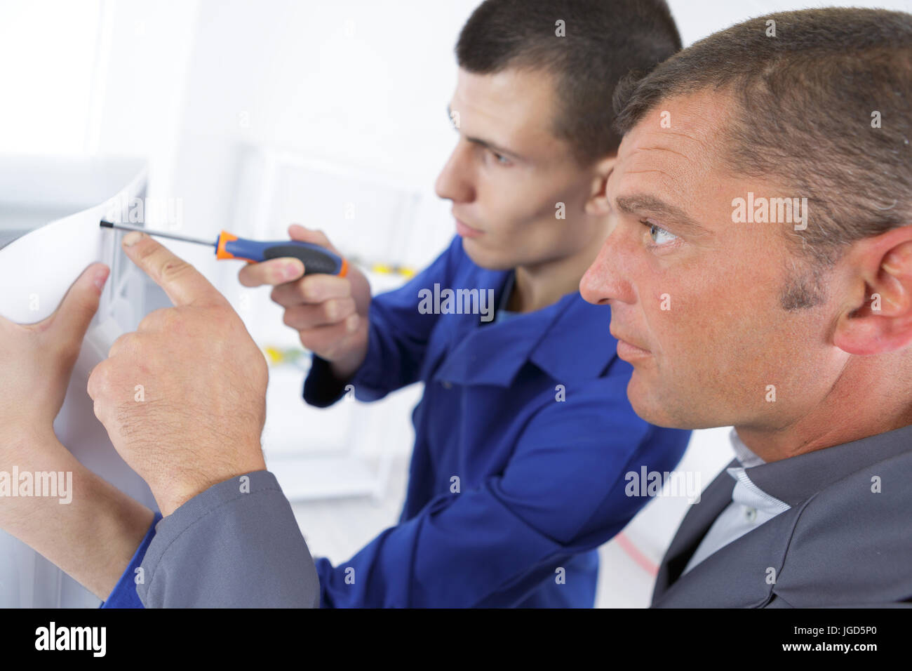 Being watched at work hi-res stock photography and images - Alamy