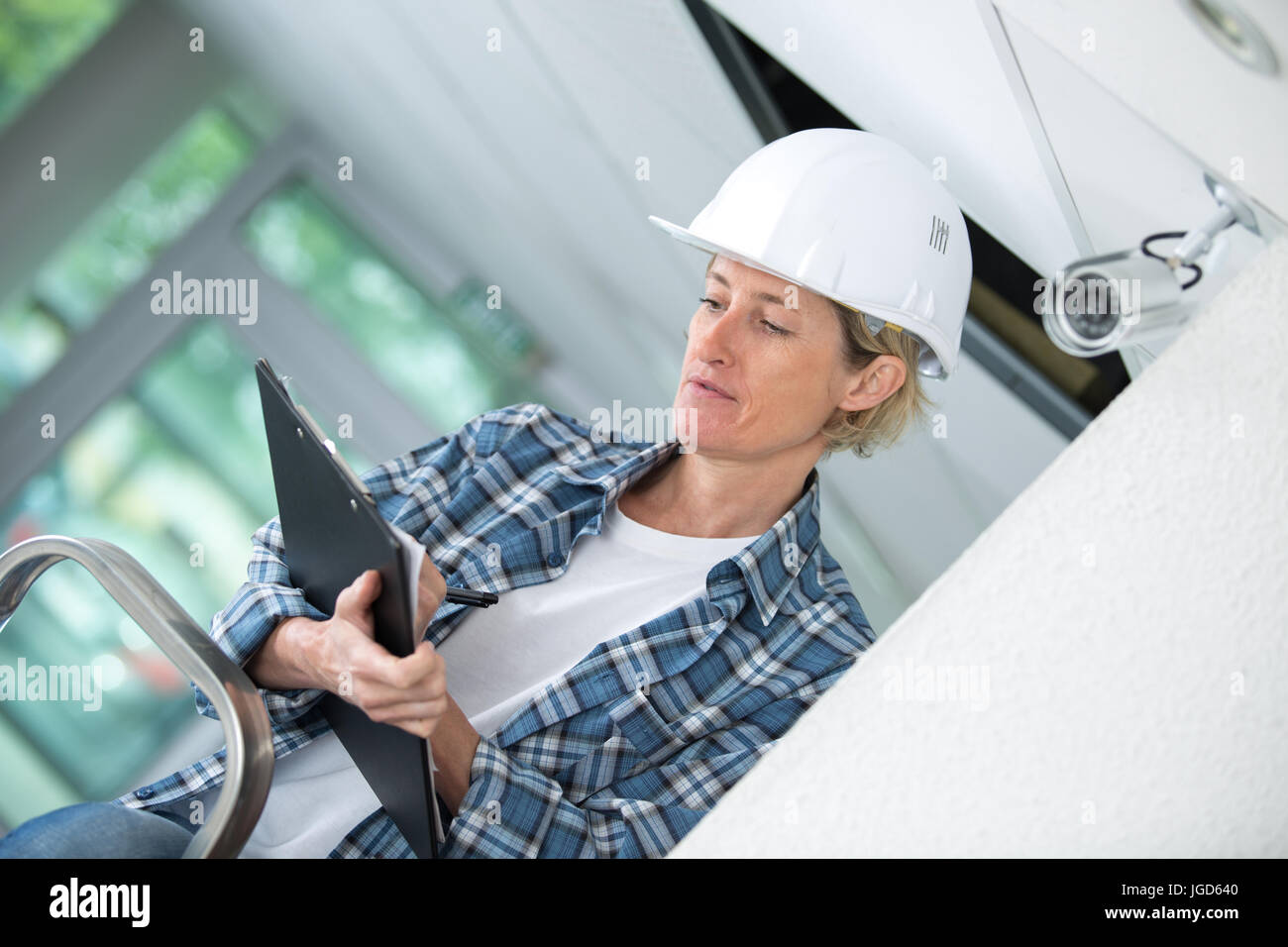 inspecting the CCTV record Stock Photo - Alamy