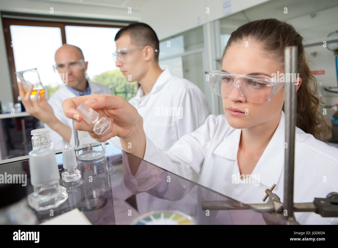 female scientist in the lab working on the tablet Stock Photo - Alamy