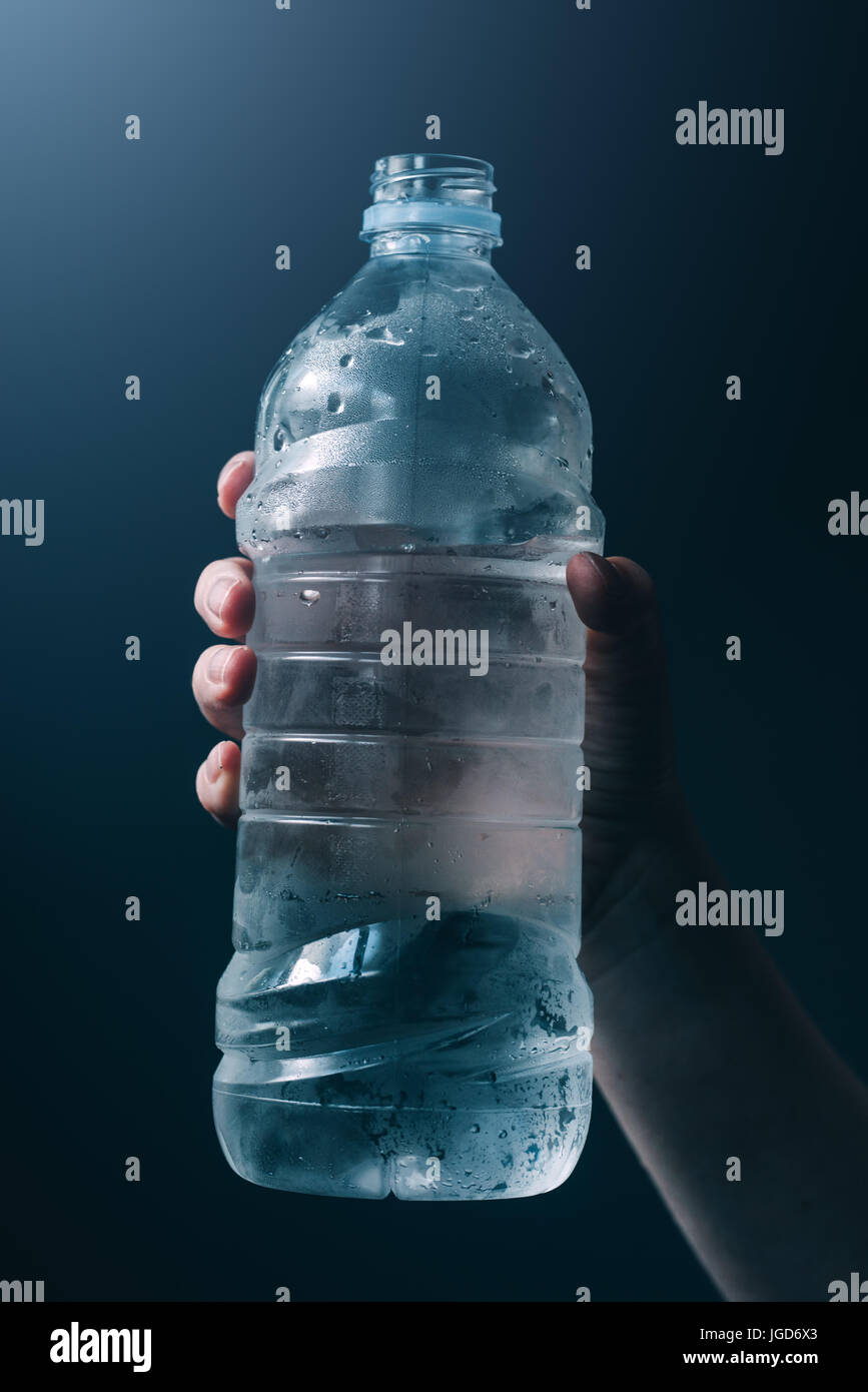 Hand and bottle hi-res stock photography and images - Alamy