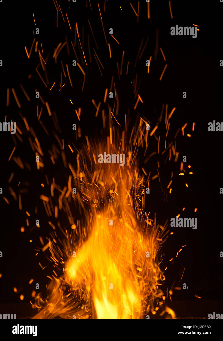 fire flames with sparks on black background Stock Photo - Alamy