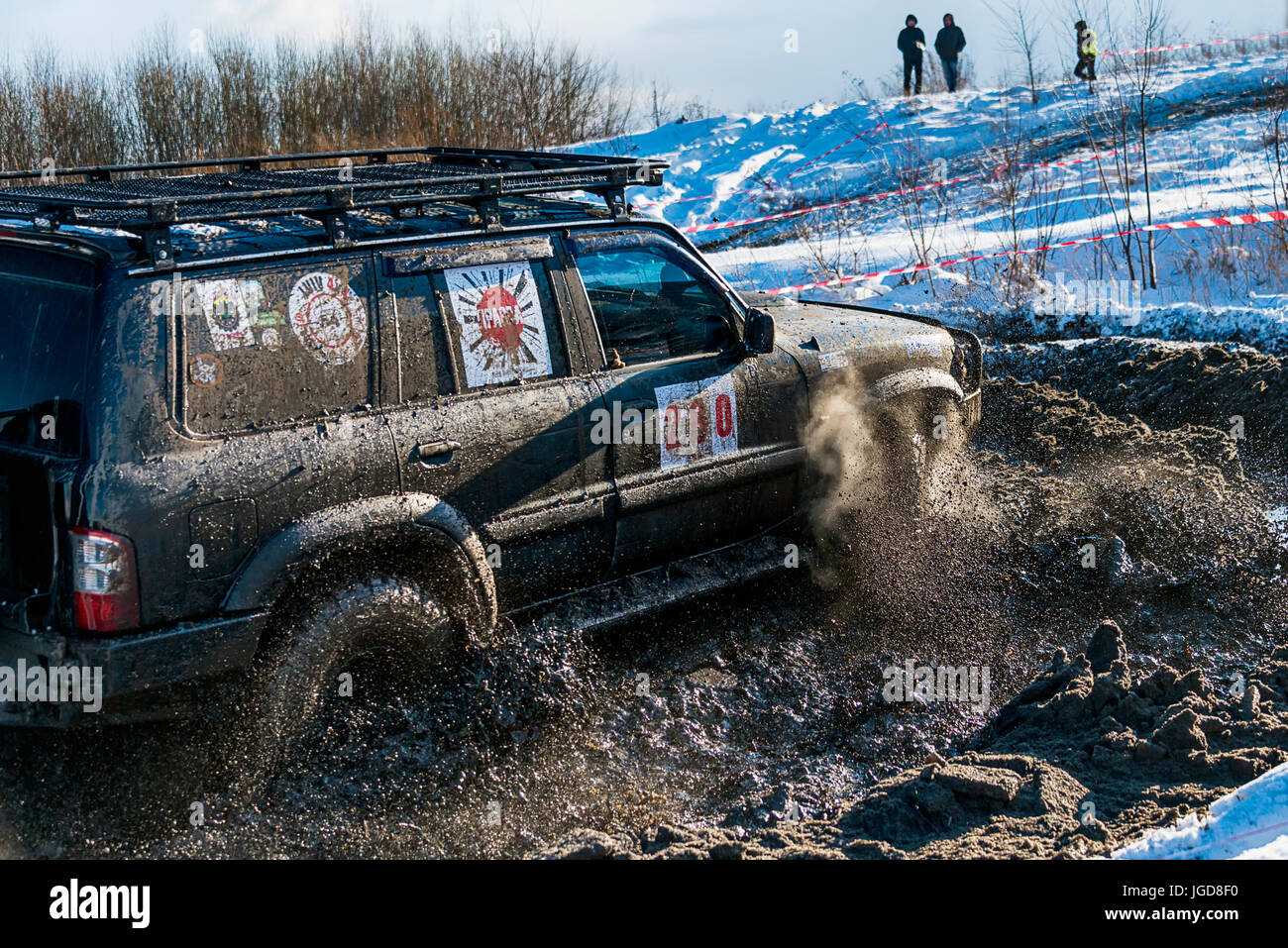 Lviv, Ukraine - December 04, 2016: Unknown racers on off-road vehicle ...