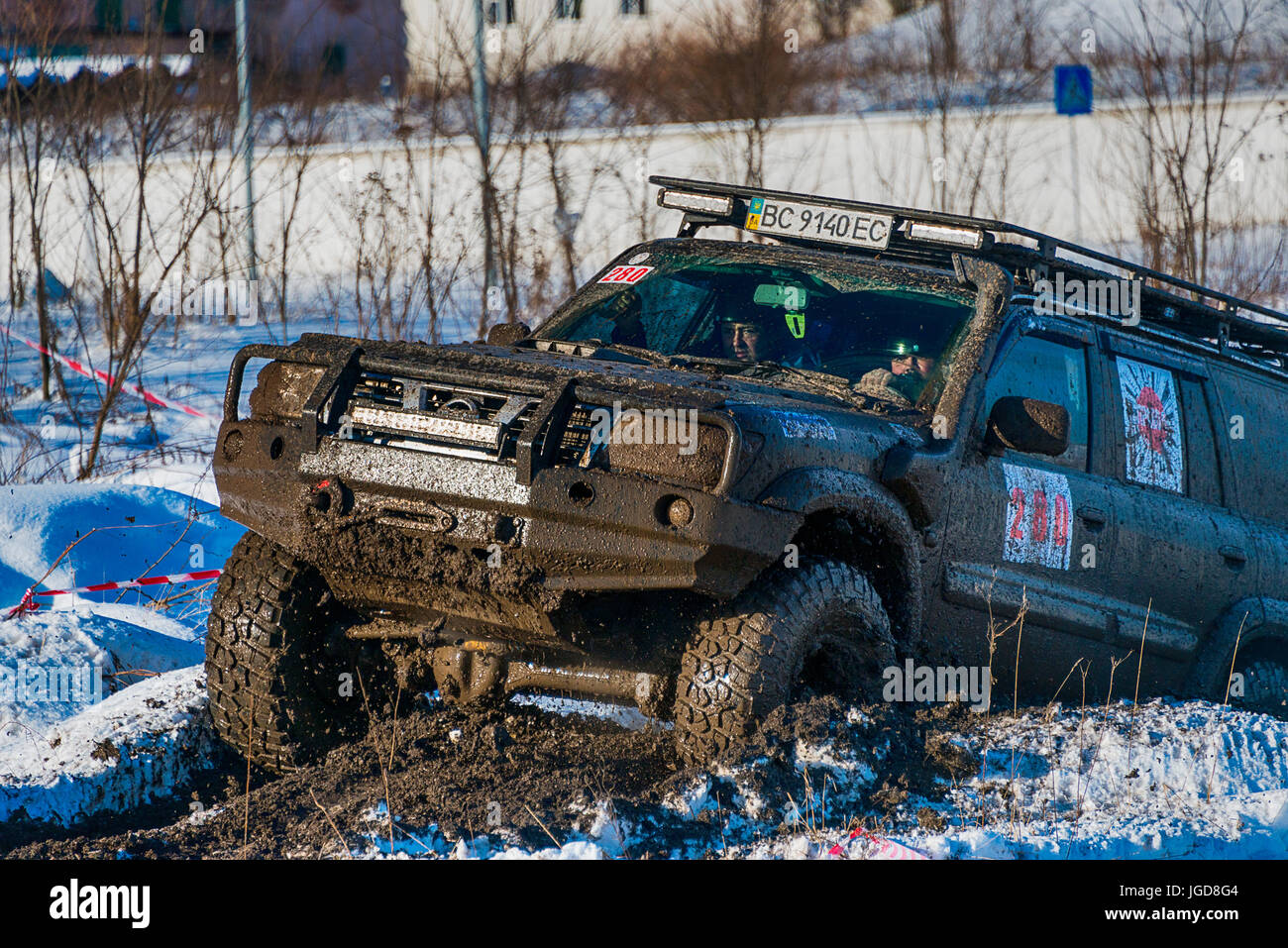 Lviv, Ukraine - December 04, 2016: Unknown racers on off-road vehicle ...