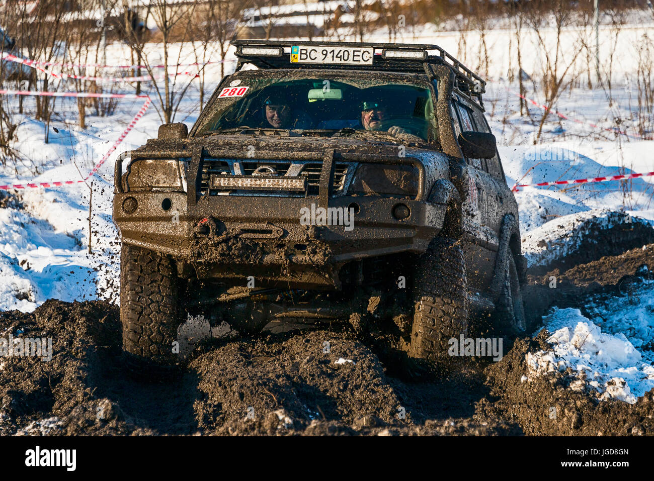 Lviv, Ukraine - December 04, 2016: Unknown racers on off-road vehicle ...